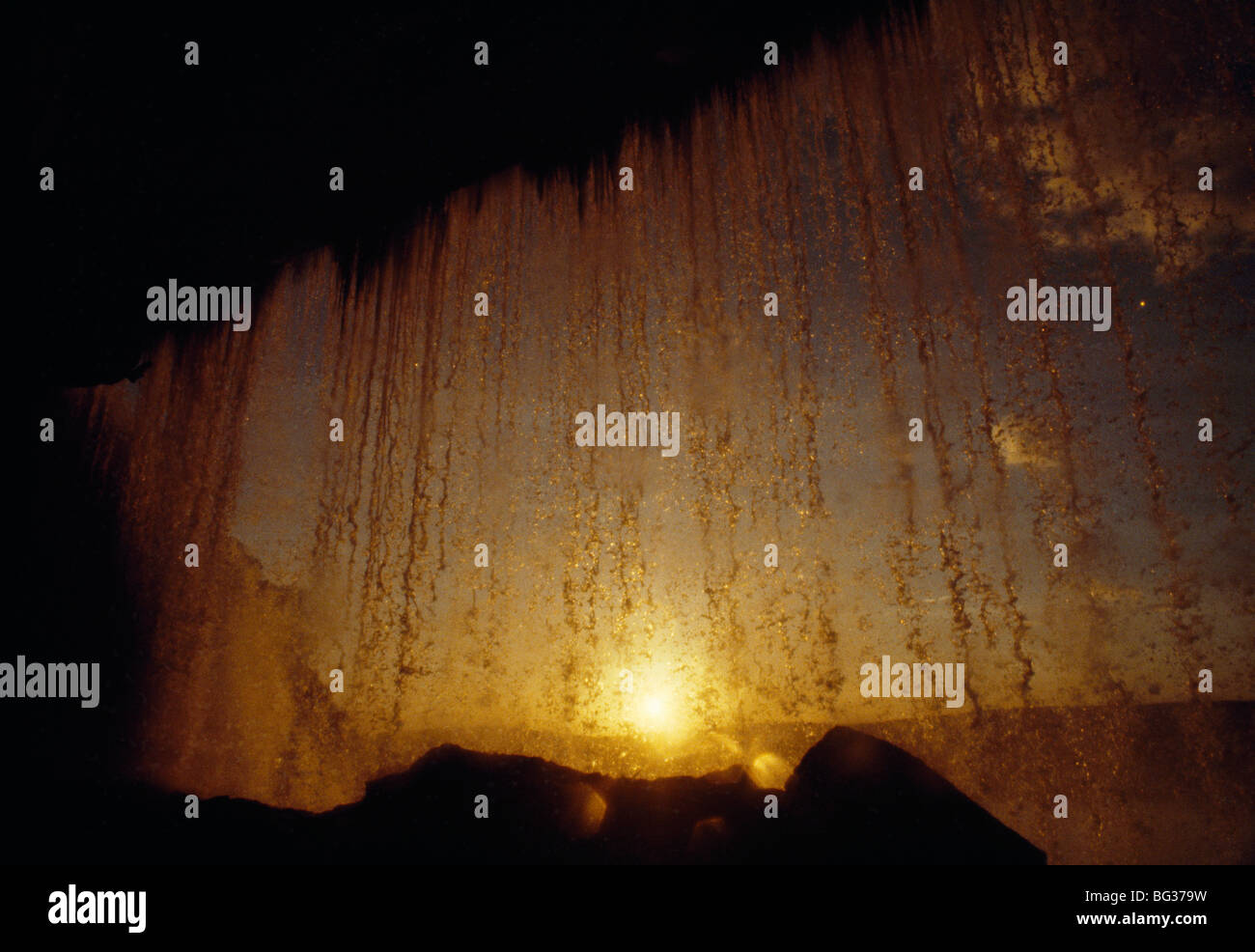 Behind the waterfall Stock Photo - Alamy