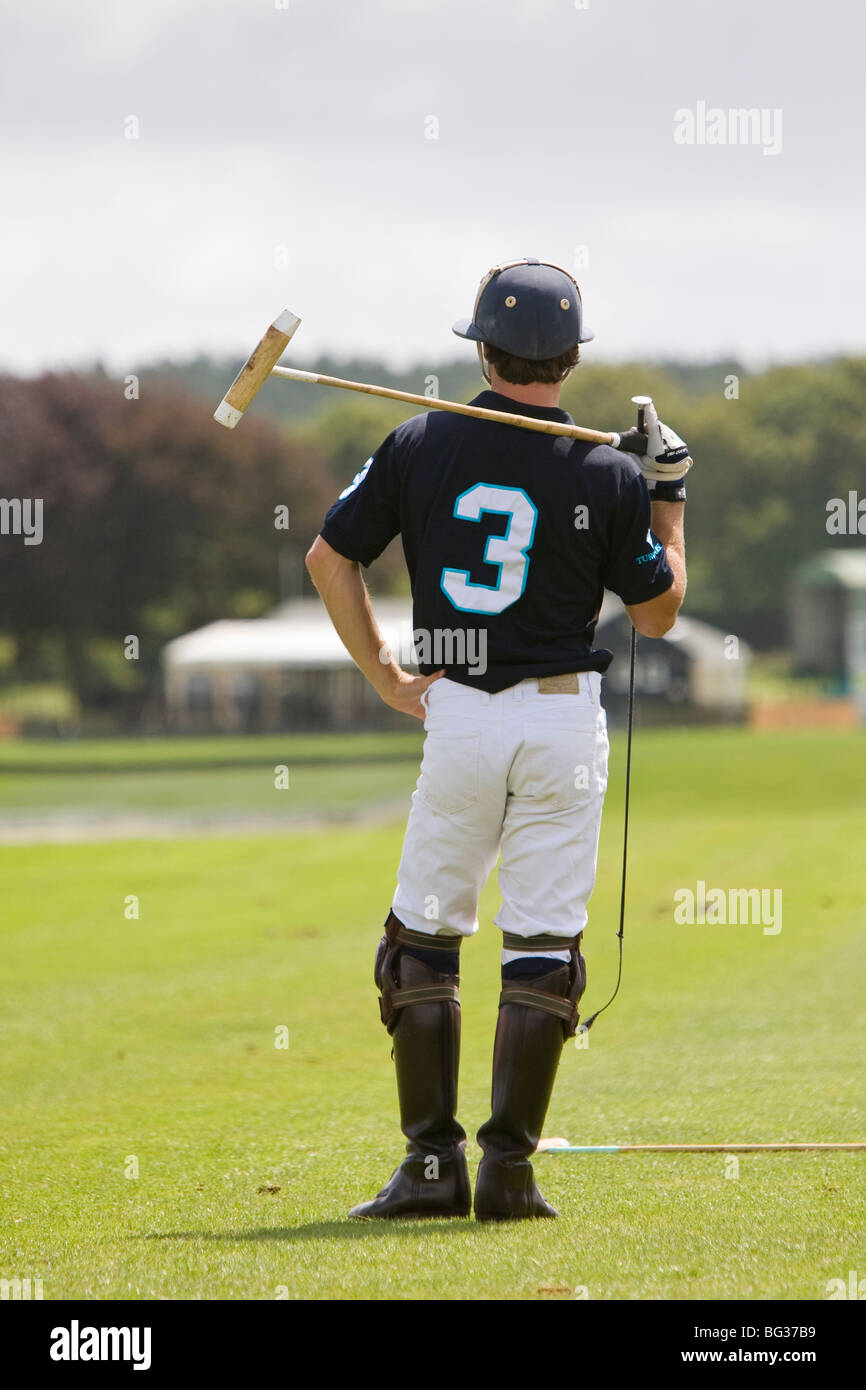 A polo player strikes a pose before a polo match, Cowdray Park, England ...