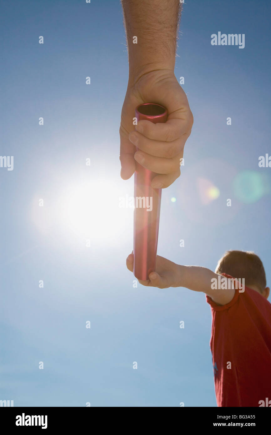 Handing off baton hi-res stock photography and images - Alamy