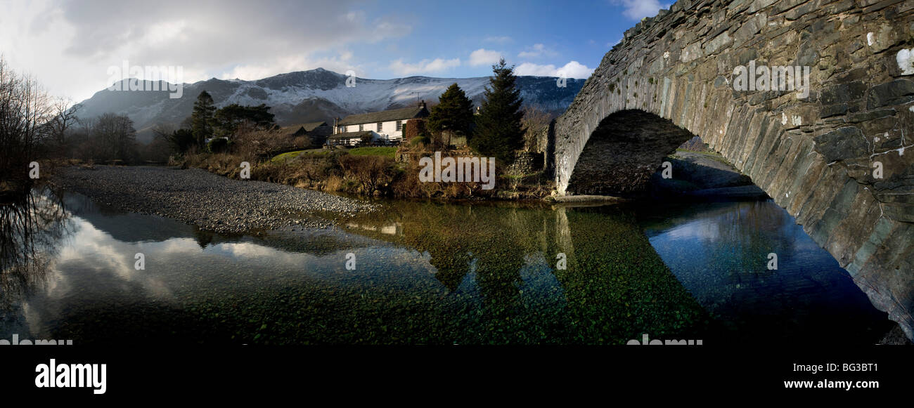Panoramic image of Lakeland cottage with bridge Stock Photo - Alamy