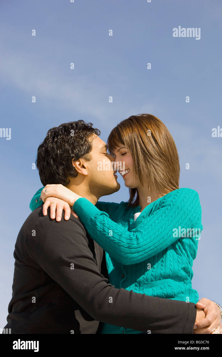 Young happy interracial couple in love Stock Photo - Alamy