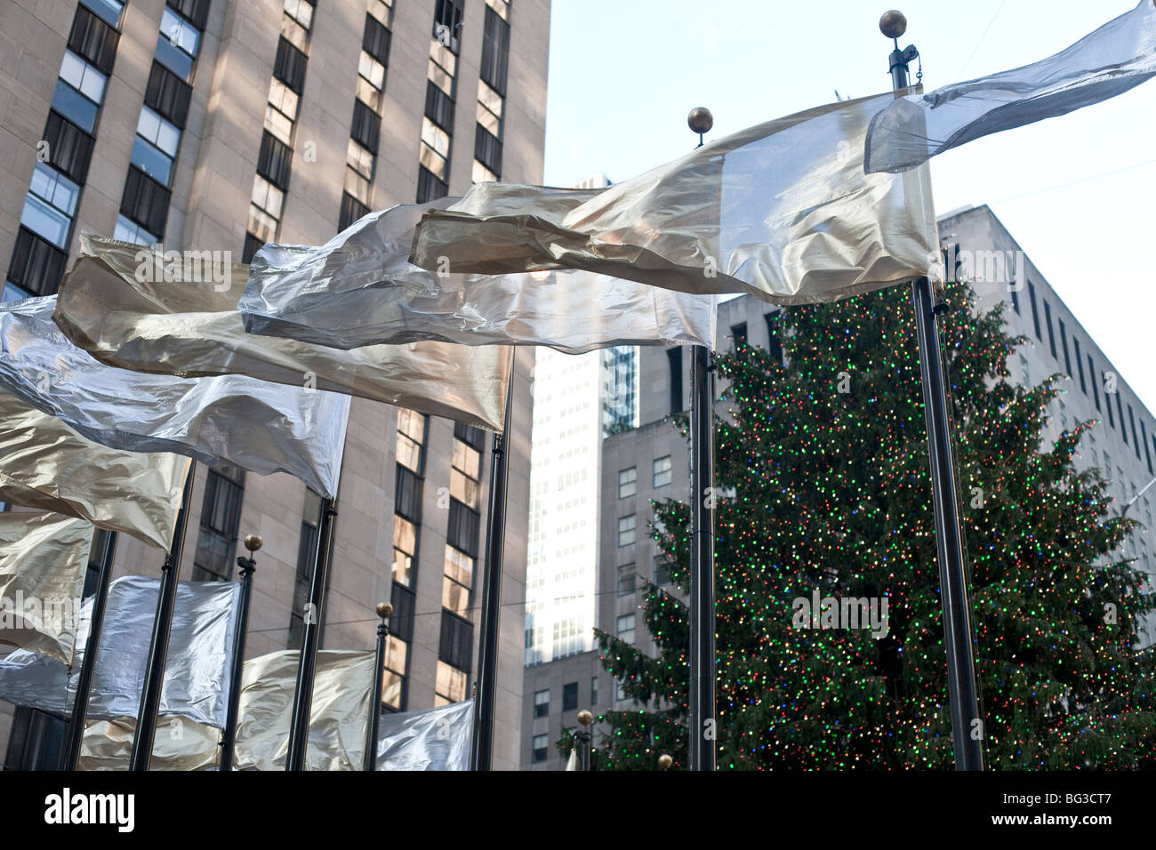 silvery pennants float gracefully in front of giant living Christmas ...