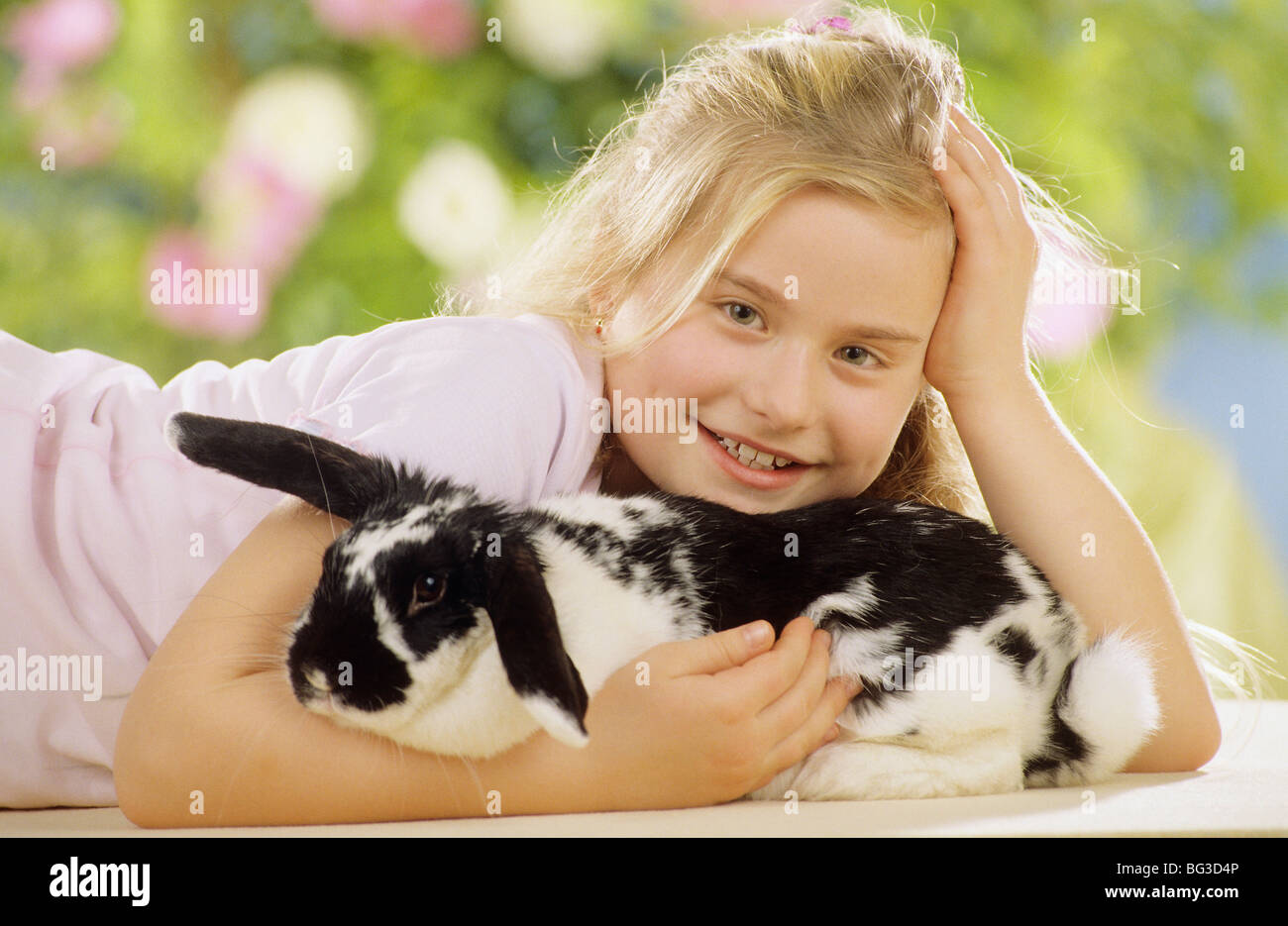 girl with rabbit Stock Photo - Alamy