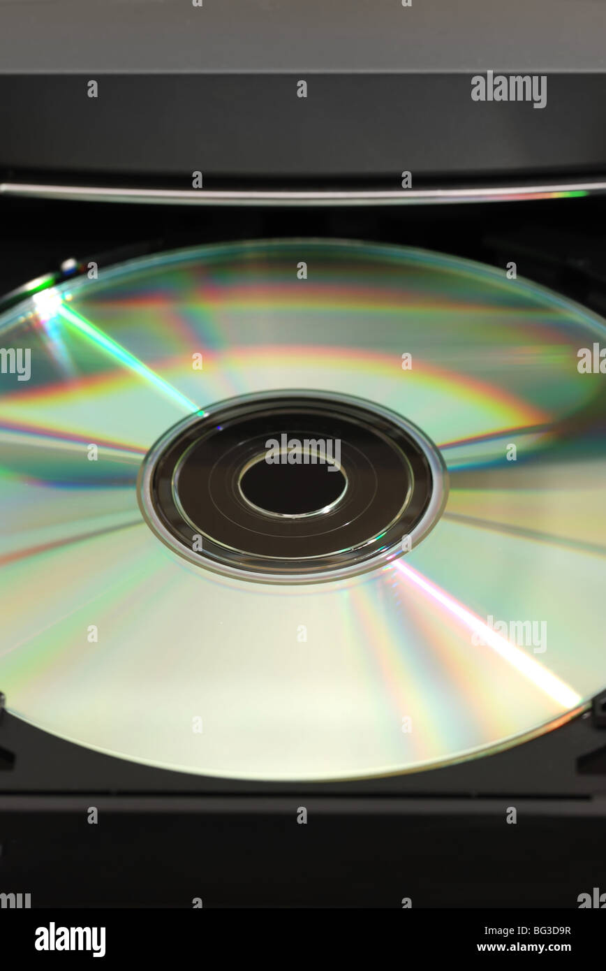 Disk in the drive. A photo close up CD of a disk Stock Photo - Alamy