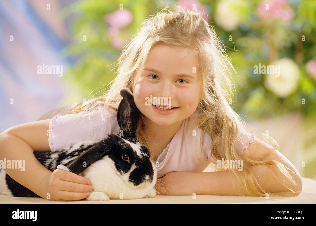 girl with rabbit Stock Photo - Alamy