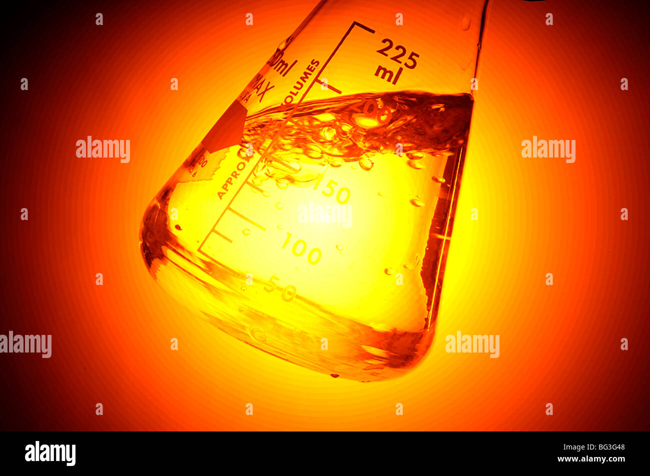 Erlenmeyer beaker and fluid in laboratory environment Stock Photo - Alamy
