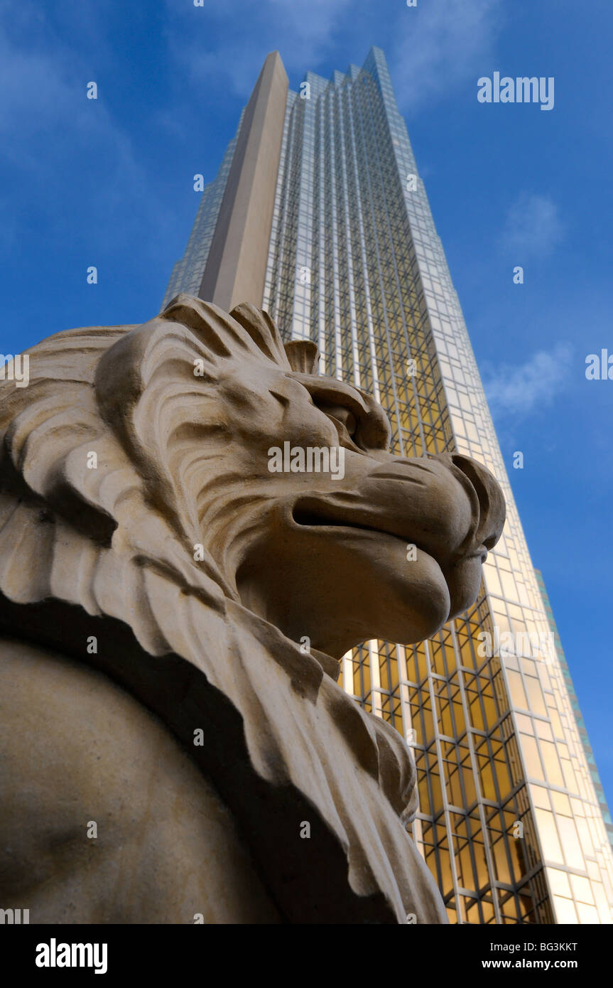 Face of lion statue and golden Royal Bank tower in Toronto Canada on ...