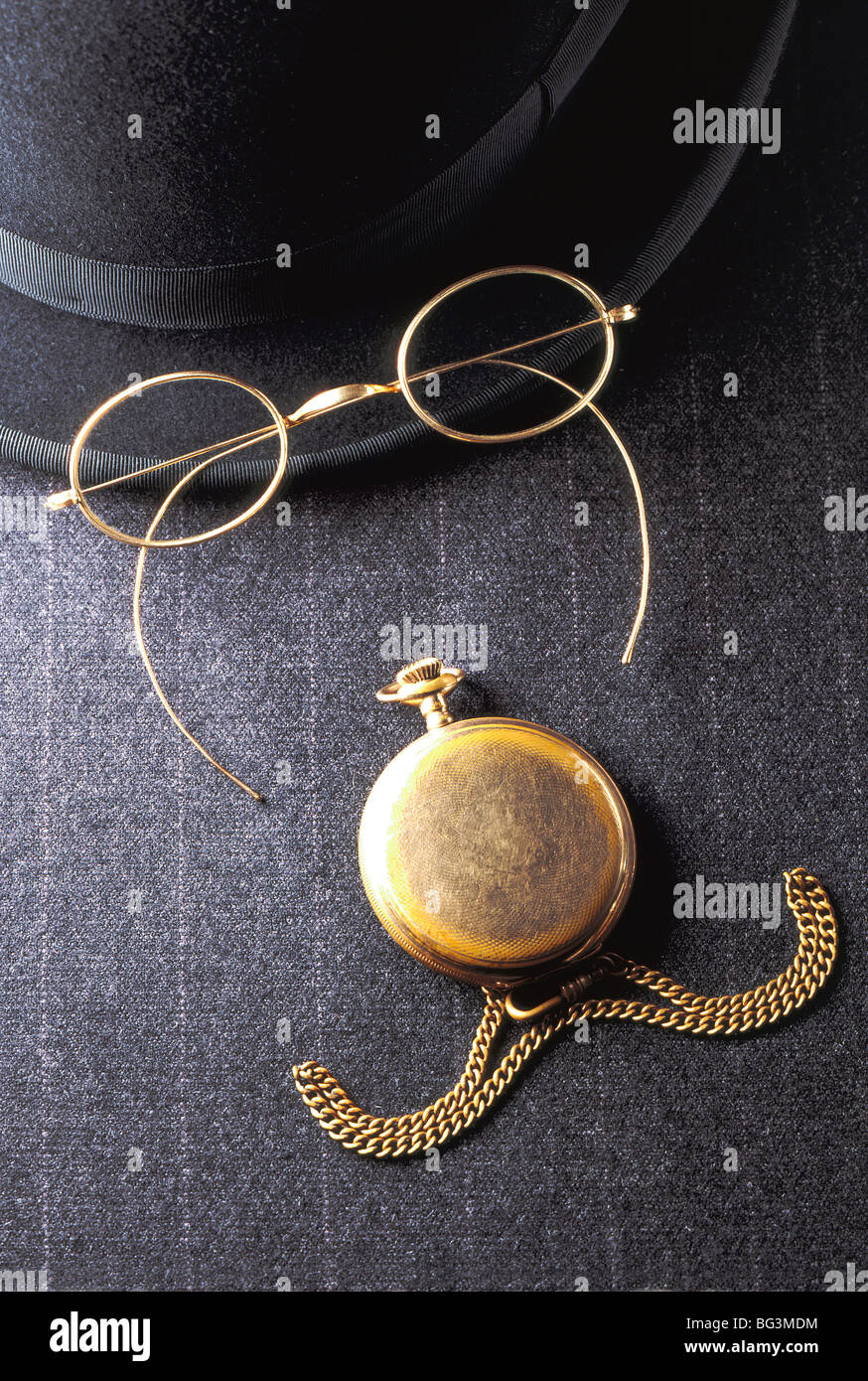 Humorous English face, conceptual still life with bowler hat, reading ...