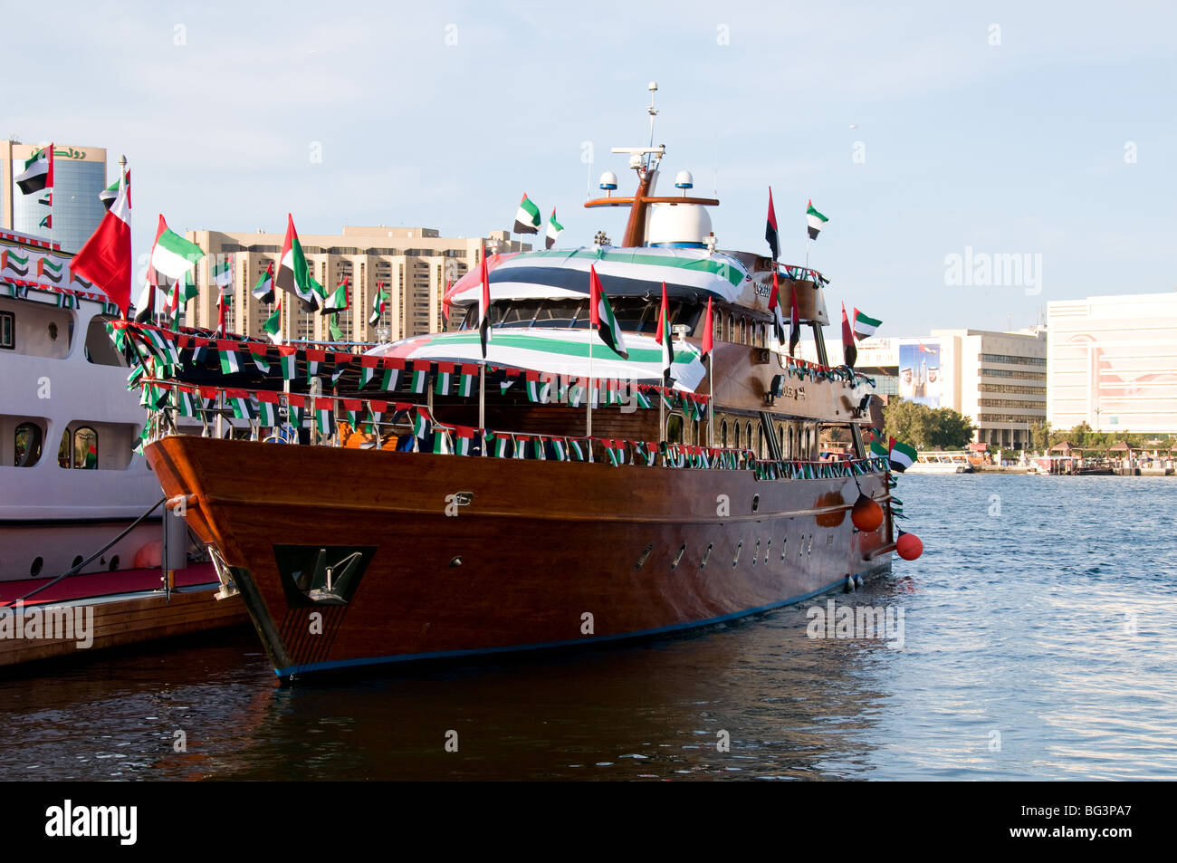 Wooden boat on Dubai Creek during National Day celebrations Stock Photo ...