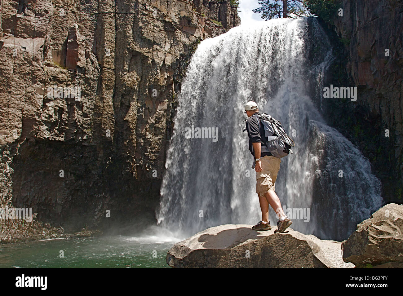 Rugged outdoors mountain scenes with hikers and climbers Stock Photo ...