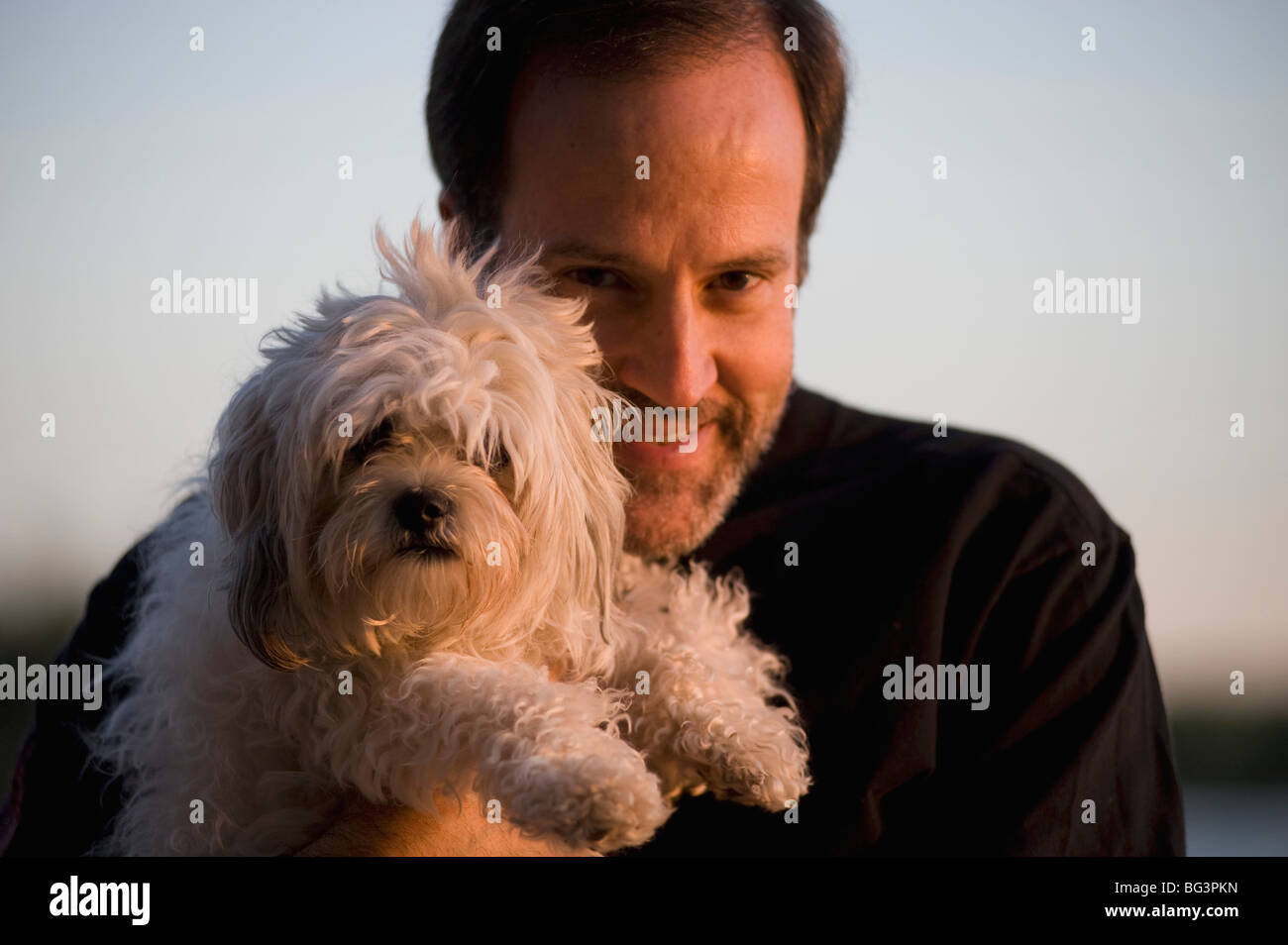 Man with is dog Stock Photo - Alamy