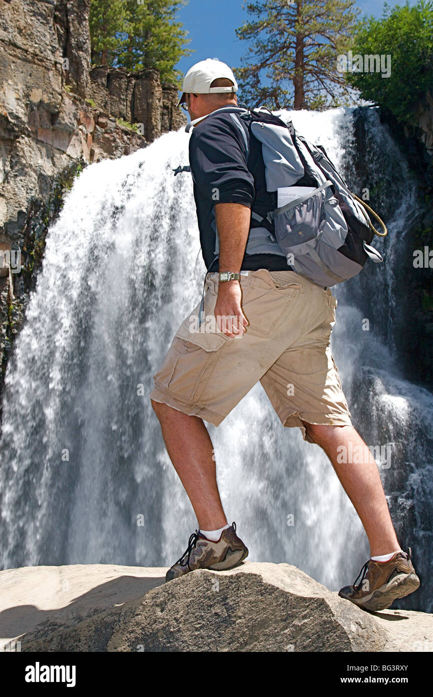 Rugged outdoors mountain scenes with hikers and climbers Stock Photo ...