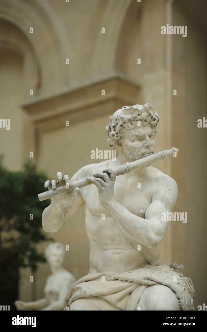 Statue flute player hi-res stock photography and images - Alamy