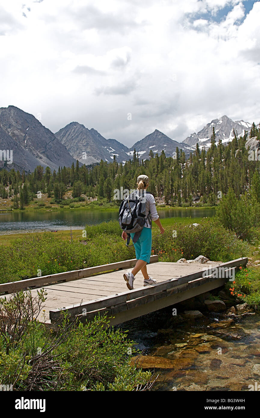 Rugged outdoors mountain scenes with hikers and climbers Stock Photo ...