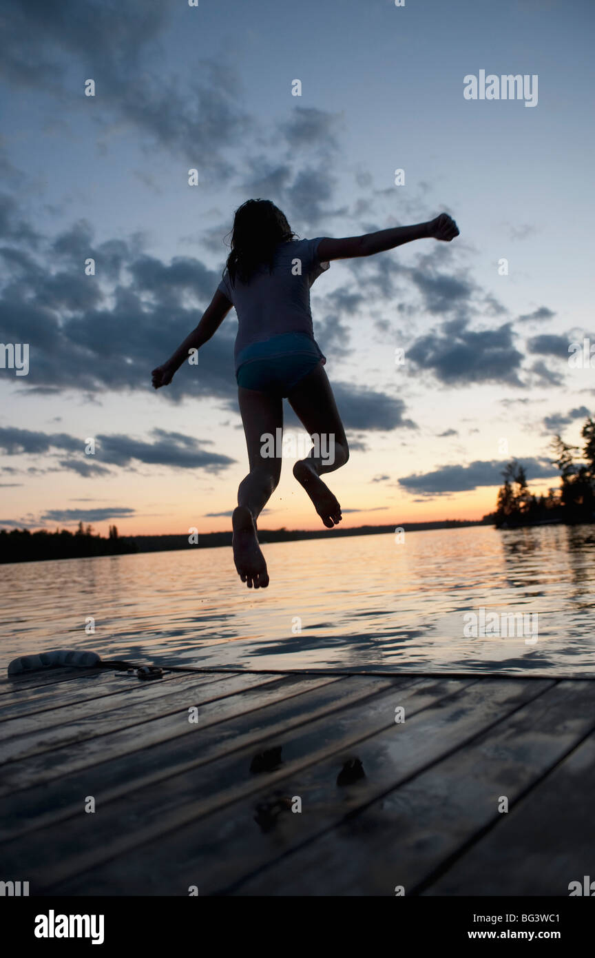Jumping off a dock hi-res stock photography and images - Alamy