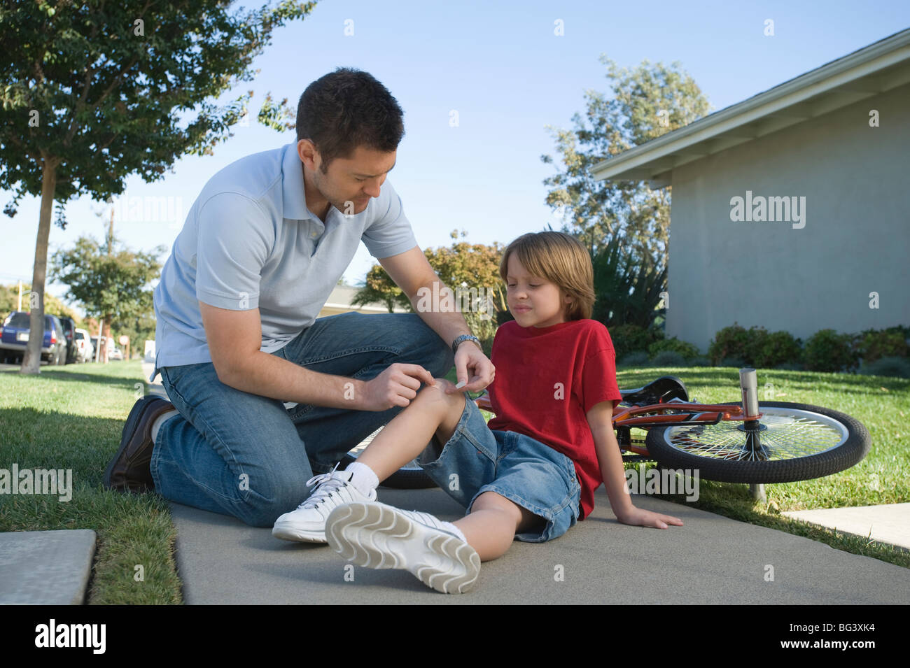Dad looking after children hi-res stock photography and images - Alamy