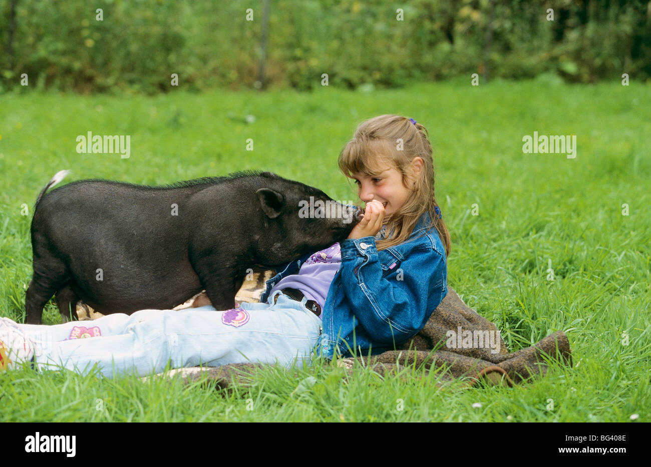 Child playing with farm animal hi-res stock photography and images - Alamy