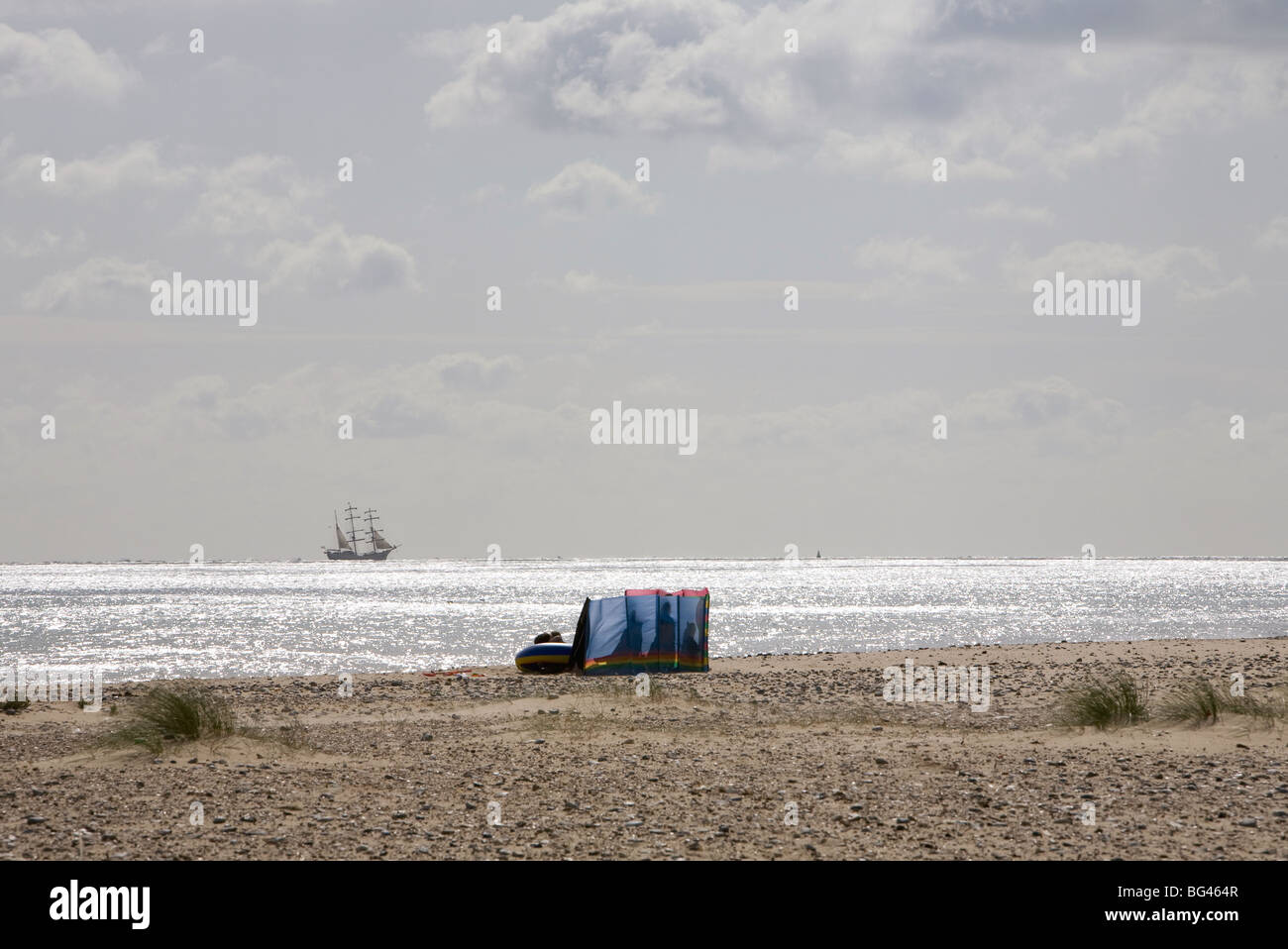 Distant sailing ship of Caister beach Stock Photo - Alamy