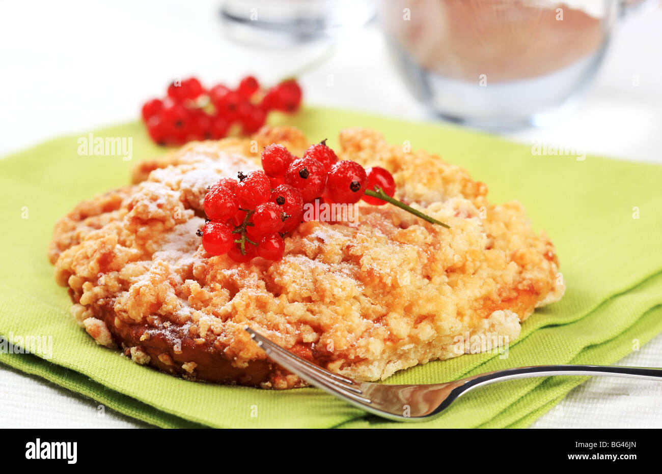 Crisp crumble cake topped with red currant Stock Photo - Alamy