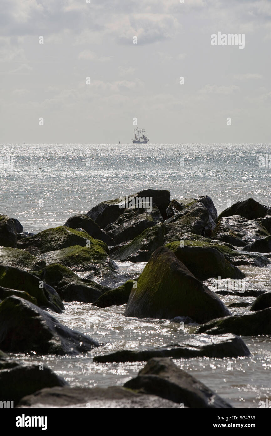 Distant sailing ship off Great Yarmouth coast Stock Photo - Alamy