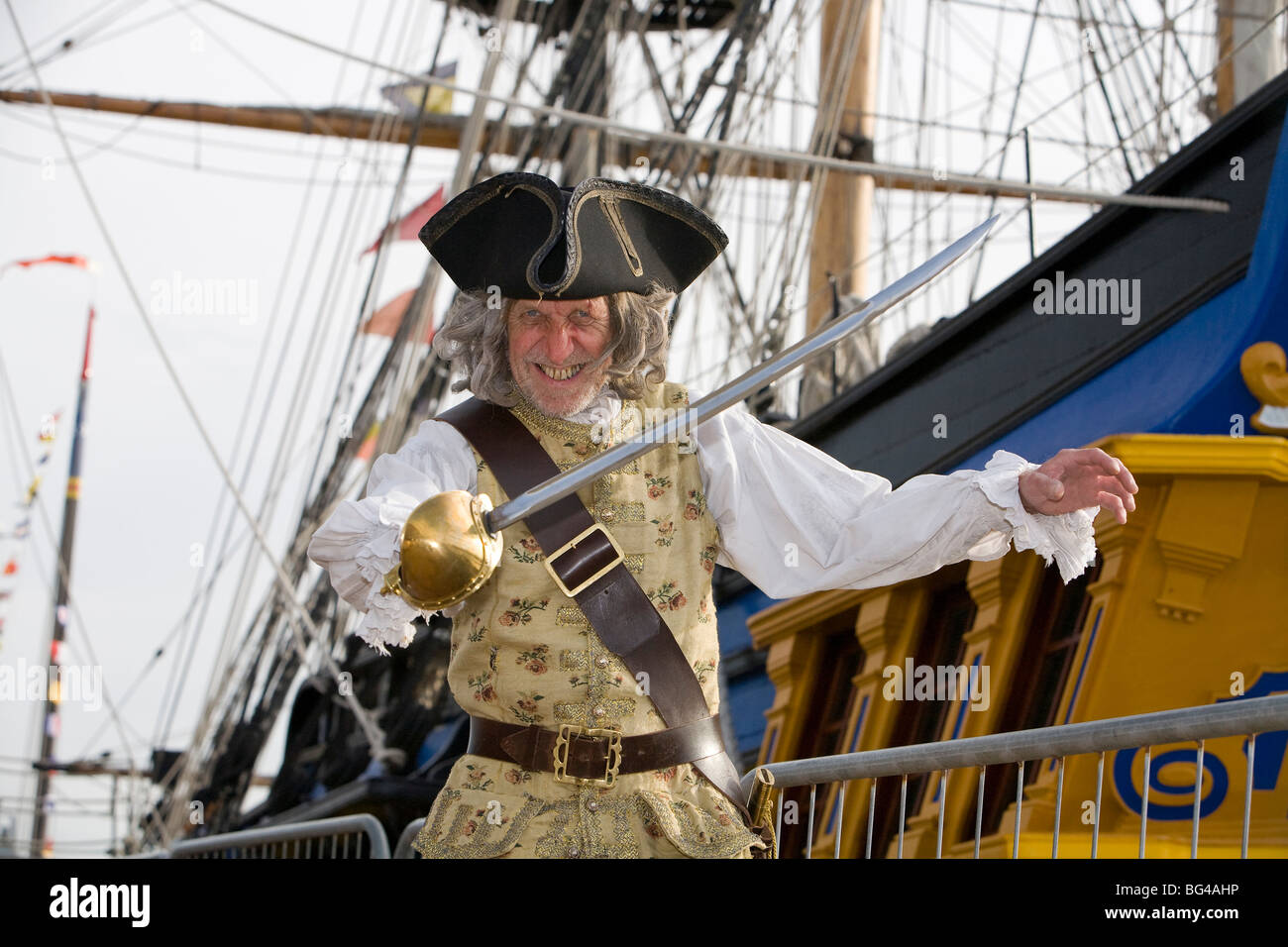 Pirate draws his sword or 'cutless' at maritime festival Stock Photo ...