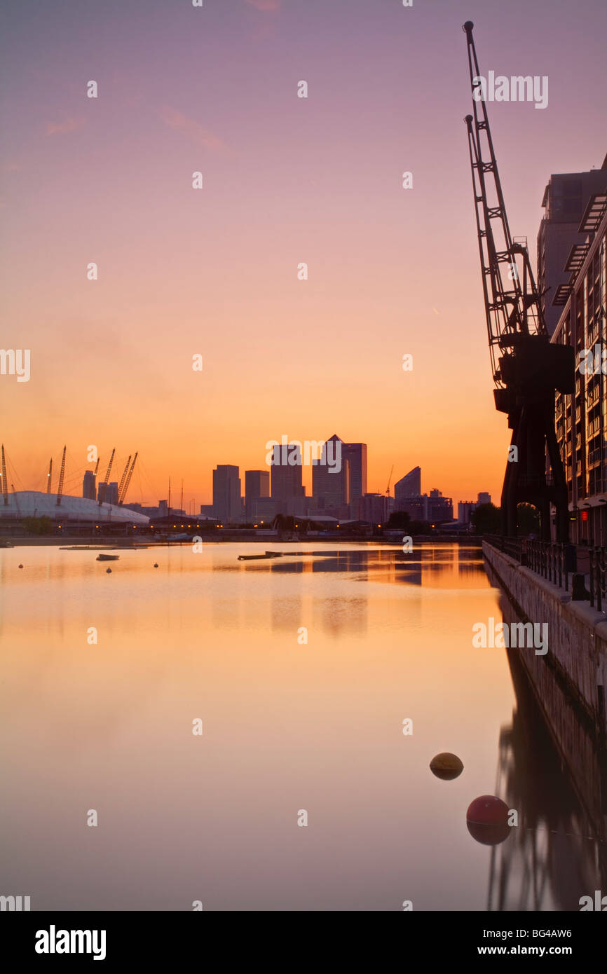 England, London, Newham,O2 Arena and Canary Wharf buildings reflecting ...