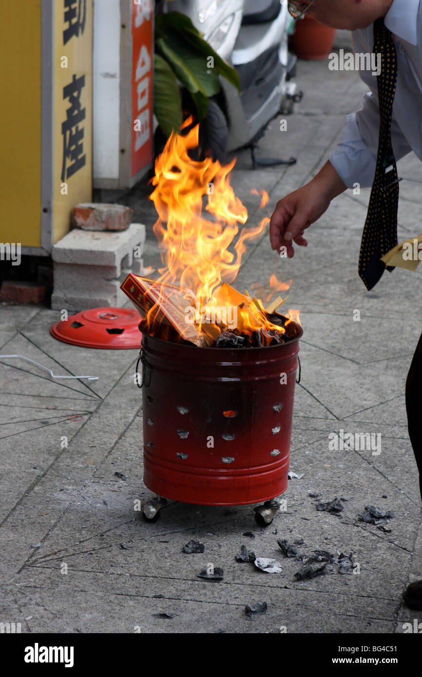 fire on a bucket in a taiwan street Stock Photo - Alamy