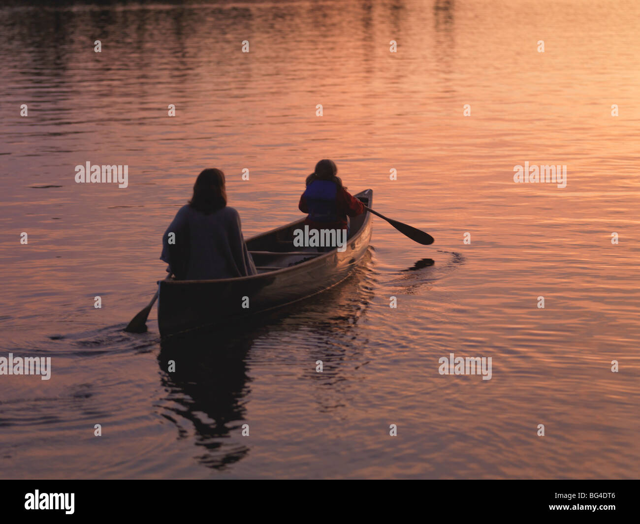 Mature woman relaxing in canoe hi-res stock photography and images - Alamy