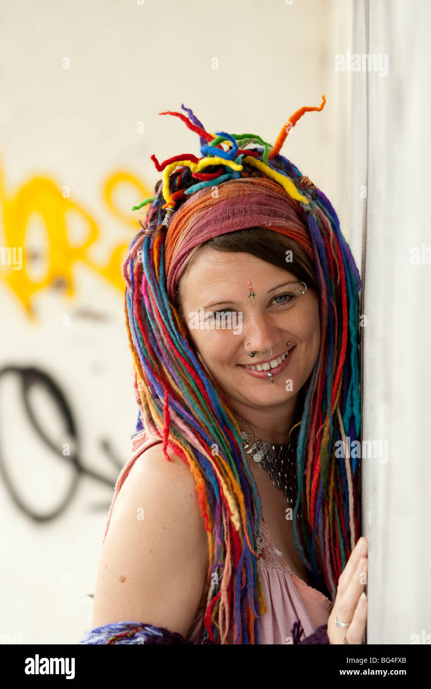 Lady Hippy with multi coloured hair smiling. FULLY MODEL RELEASED Stock ...