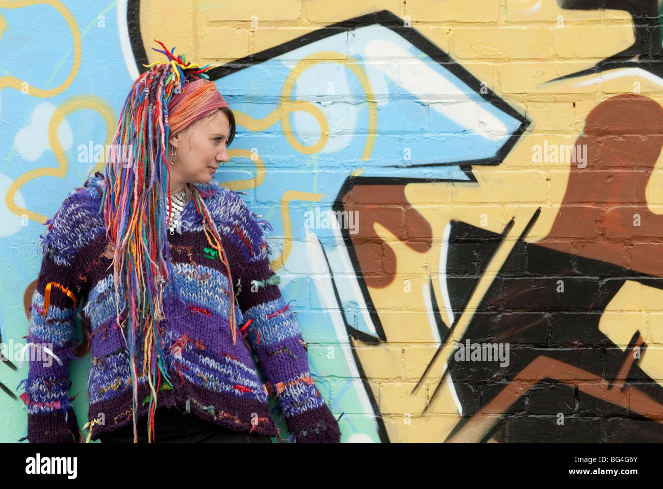 Lady Hippy with multi coloured hair smiling. FULLY MODEL RELEASED Stock ...