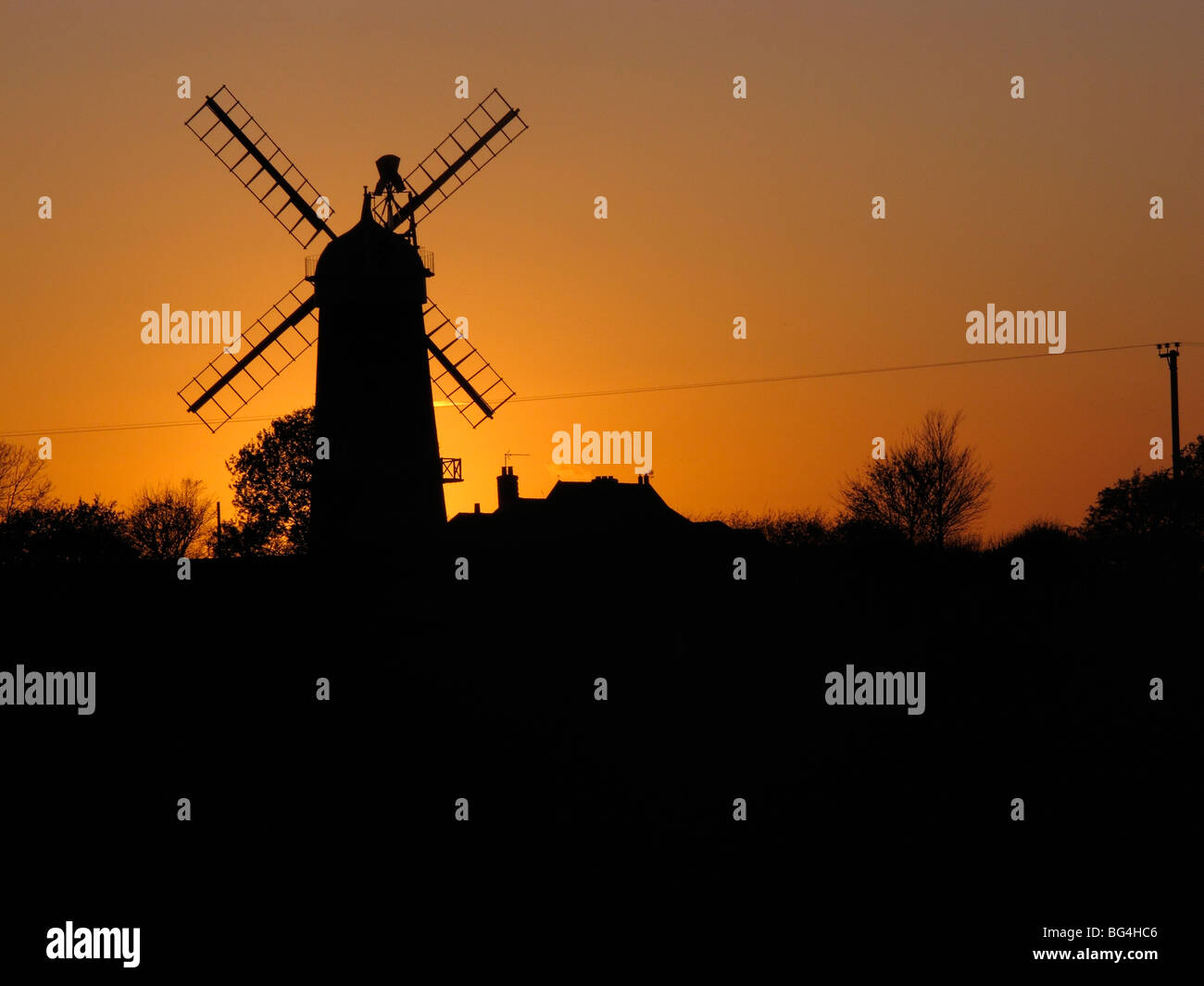 Windmill at sunset, Norfolk, Nov 2009 Stock Photo - Alamy