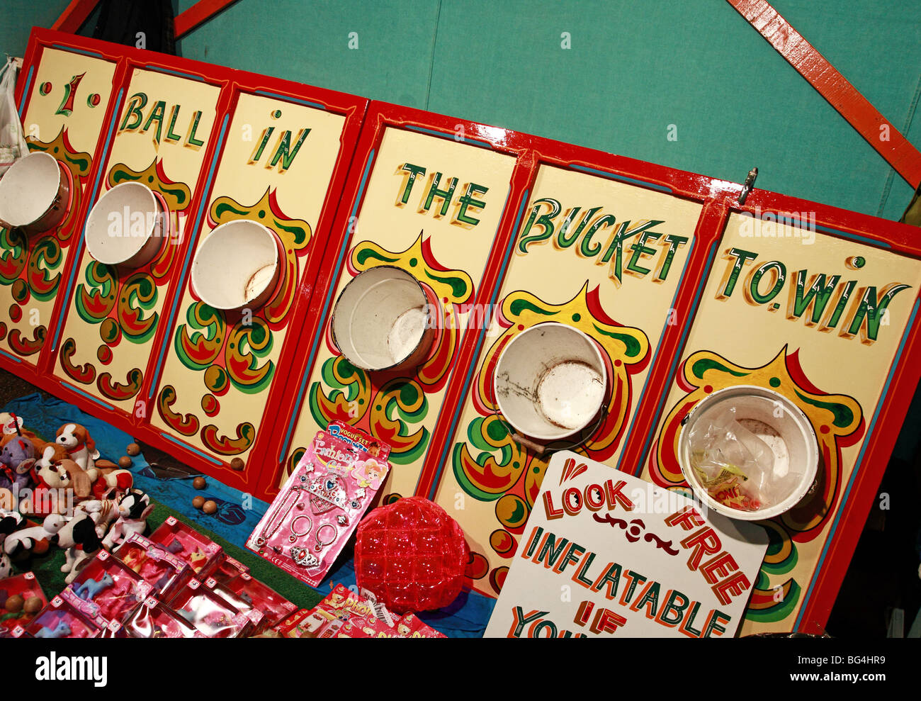 A brightly coloured stall at a traditional funfair or carnival Stock ...