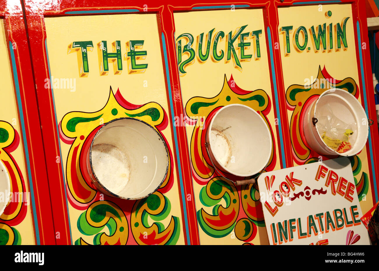 A brightly coloured stall at a traditional funfair or carnival Stock ...