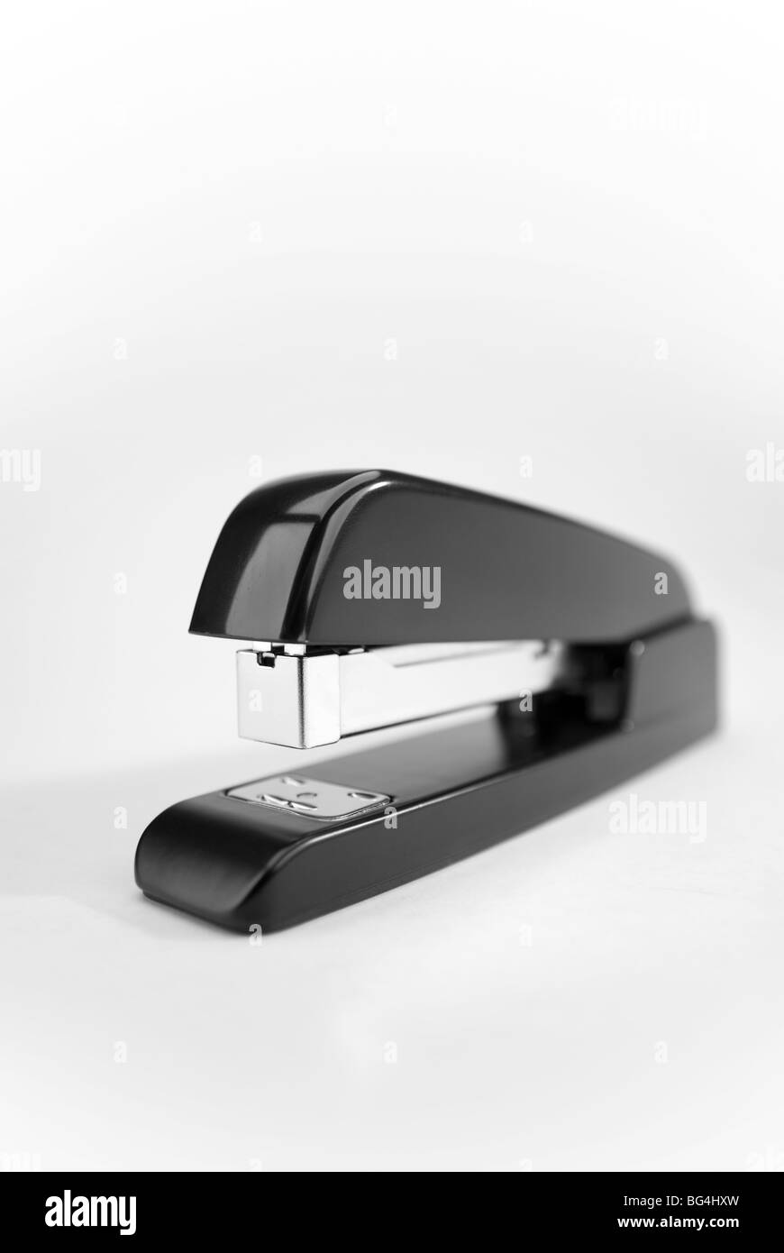 Close-up image of a black stapler on a white background Stock Photo - Alamy