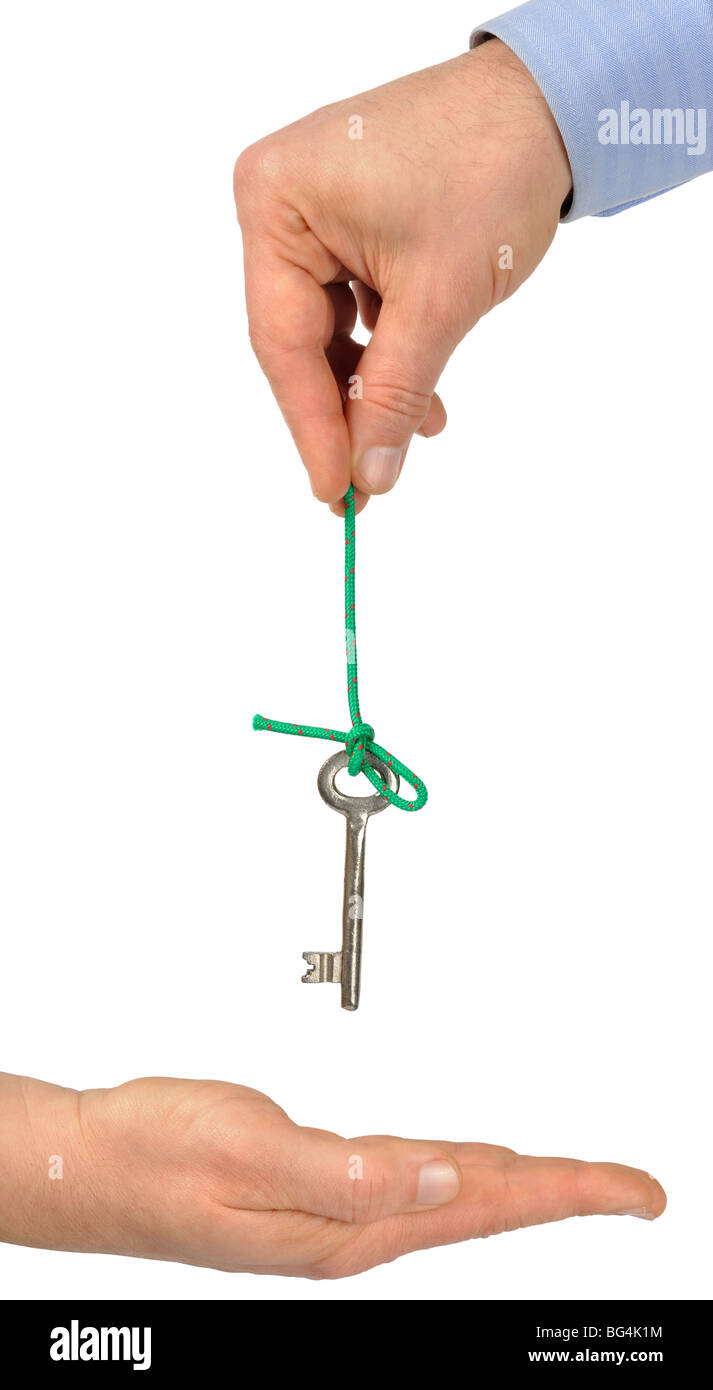 Hands with Key Stock Photo - Alamy