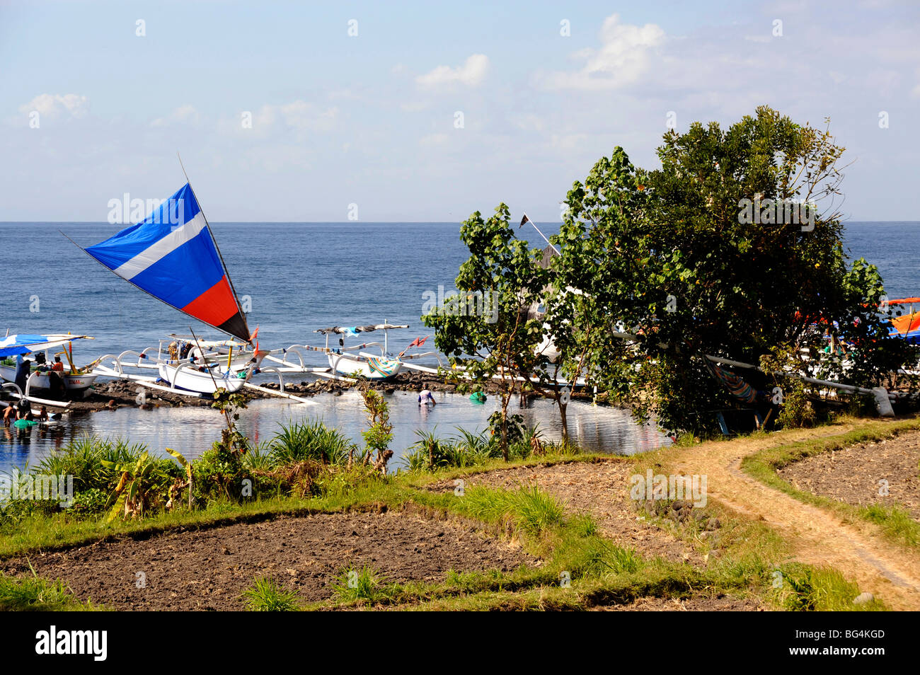 Traditional prahu in Ujung fishing harbour near Amlapura, Bali ...