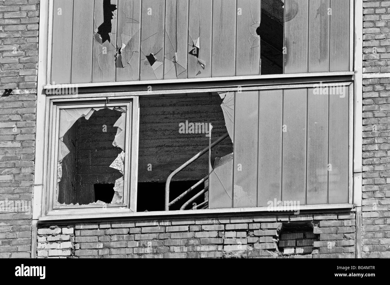 Broken window in a industrial building Stock Photo - Alamy