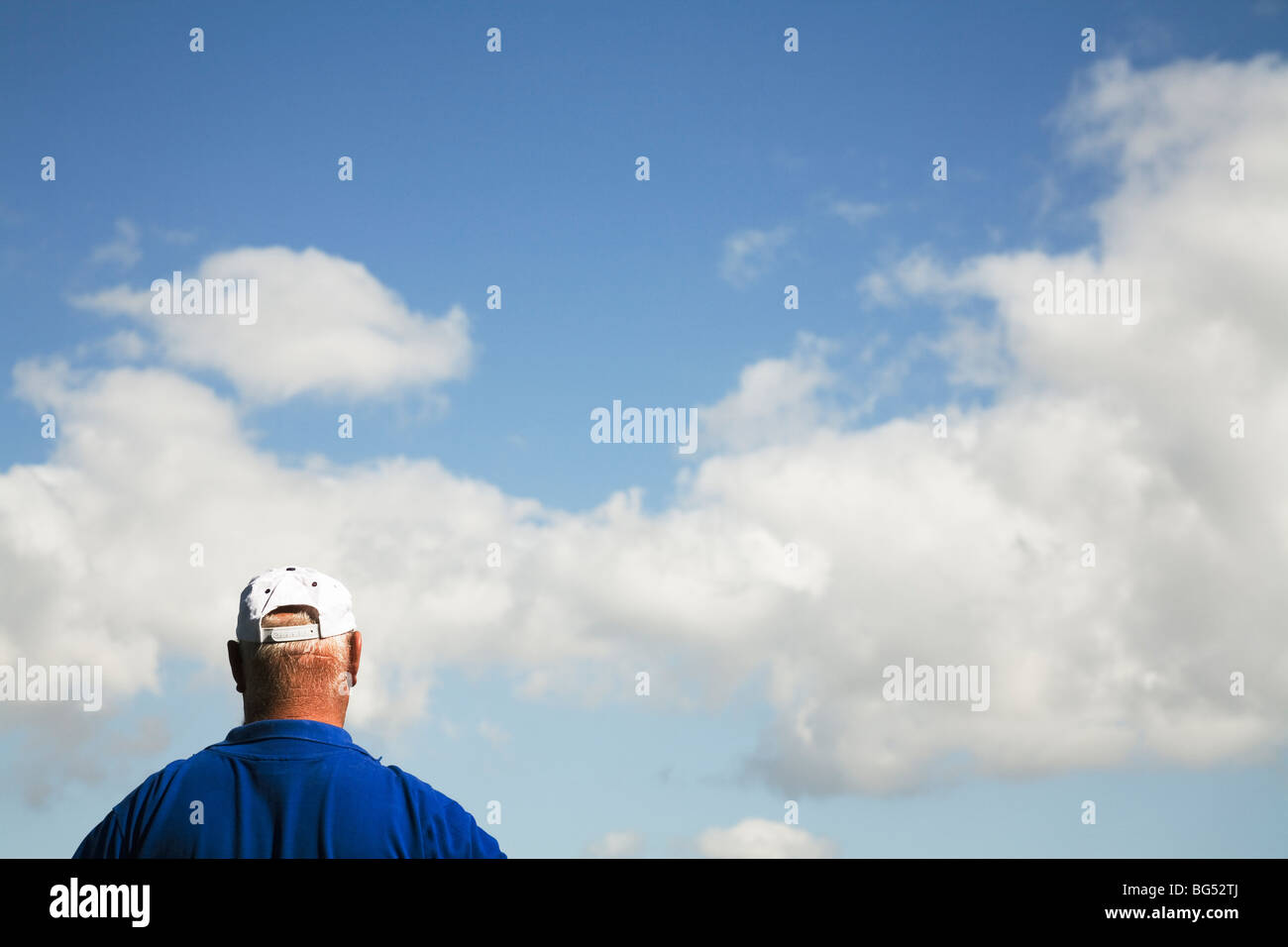 Man and sky Stock Photo - Alamy