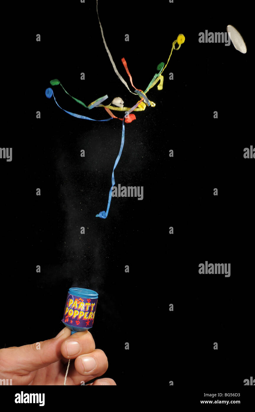 Party popper popping Stock Photo - Alamy