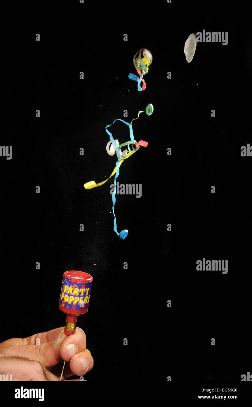 Party popper popping Stock Photo - Alamy