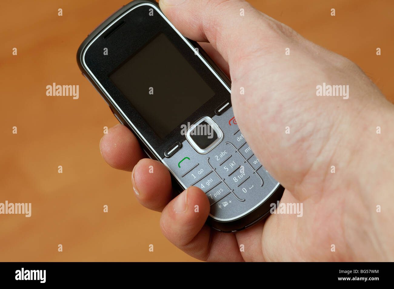 the modern mobile phone in hand Stock Photo - Alamy