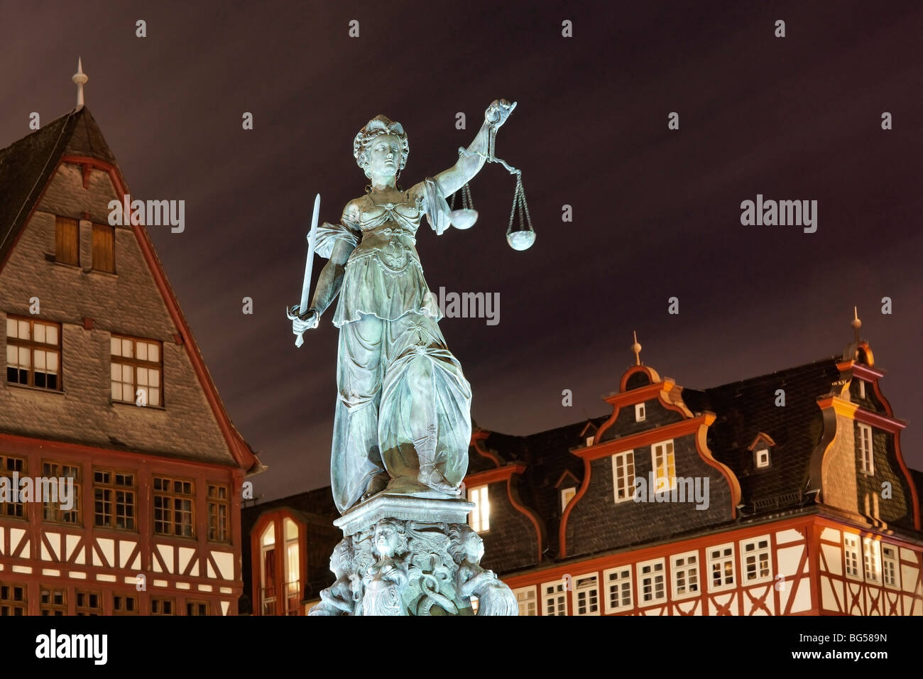 Lady Justice by night in Frankfurt. Germany Stock Photo - Alamy