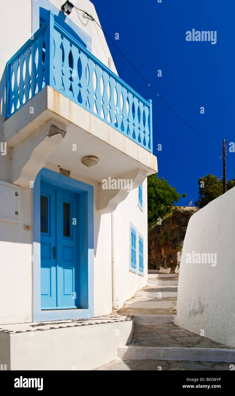 Traditional village street scene in Mandraki on the Greek island of ...