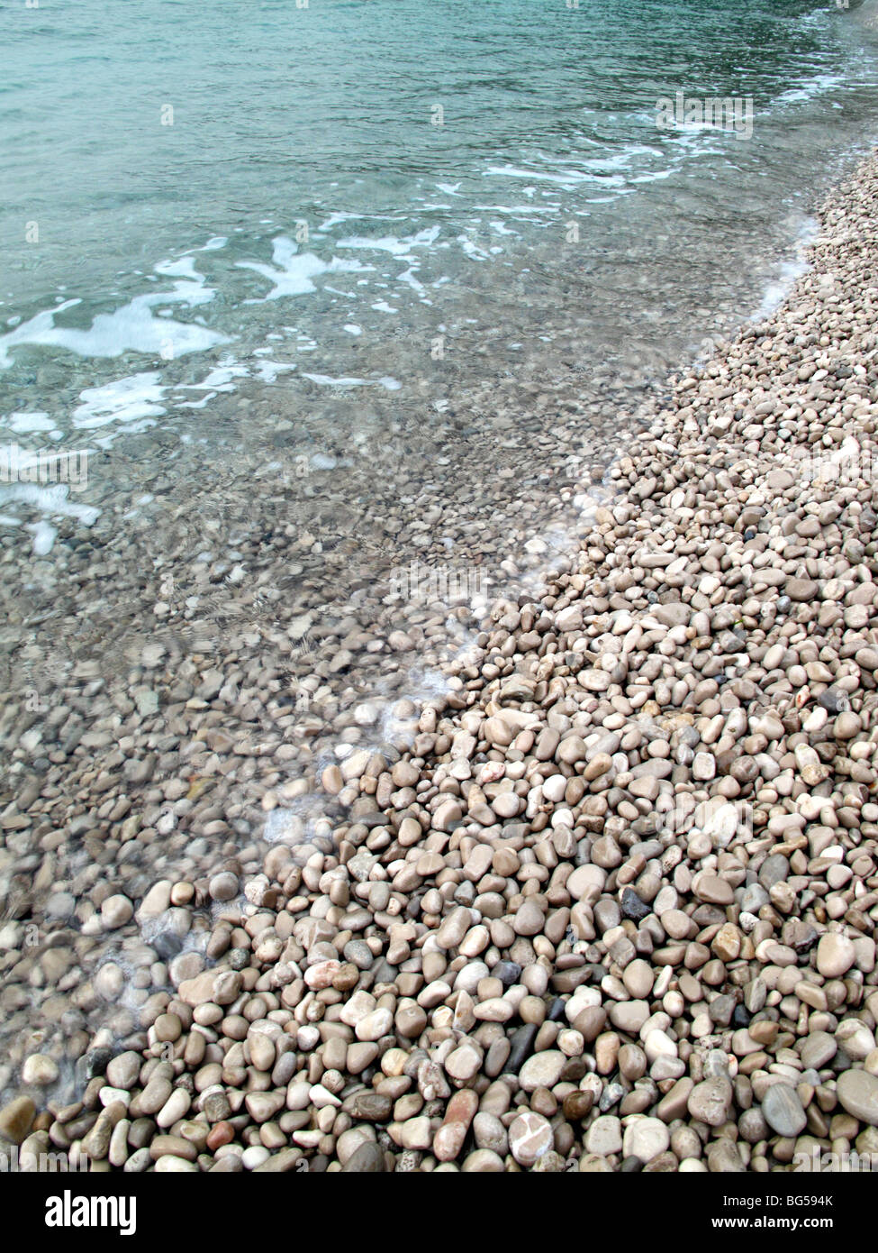 Clear sea water pebble beach hi-res stock photography and images - Alamy