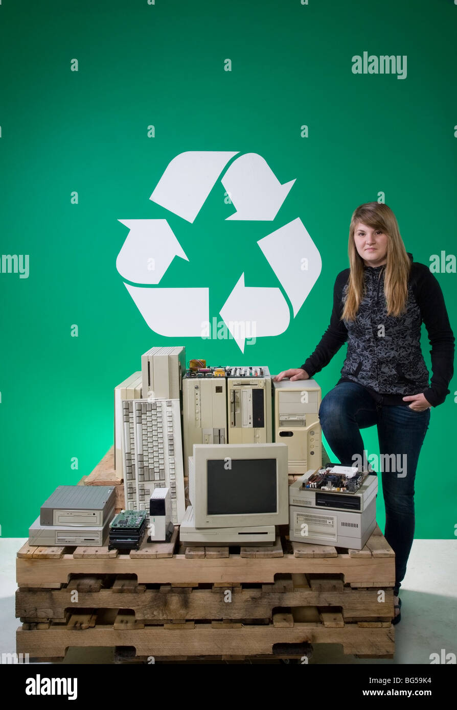 Woman recycling computers Stock Photo - Alamy