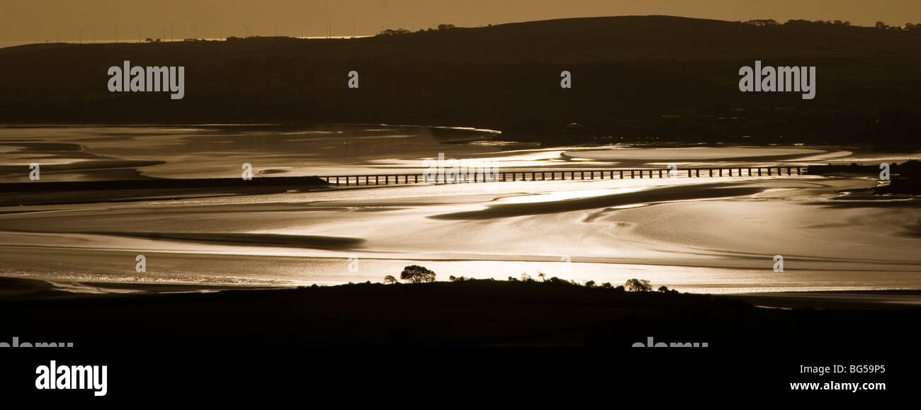 Arnside viaduct a railway bridge over the estuary of the River Kent ...