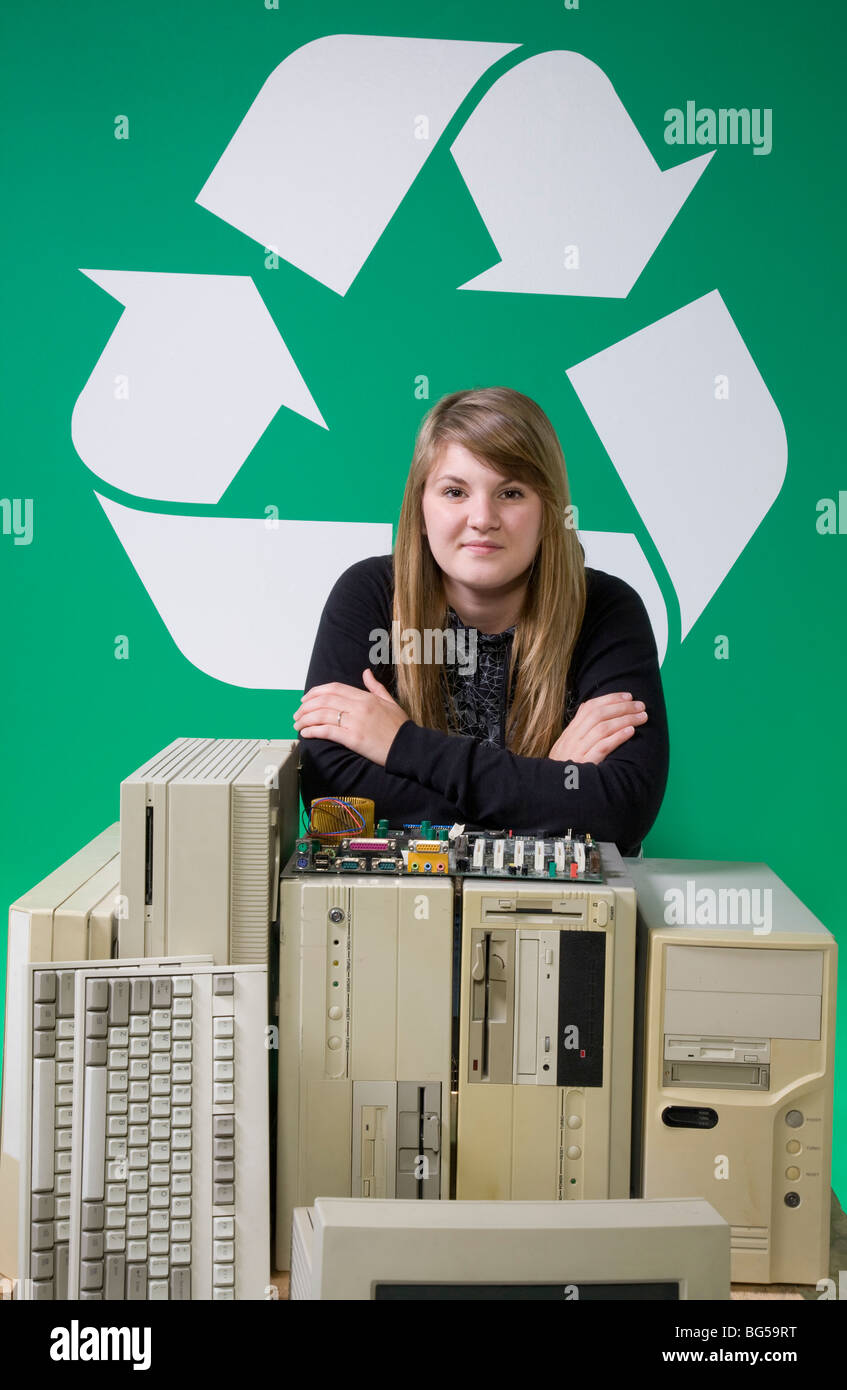 Woman recycling computers Stock Photo - Alamy