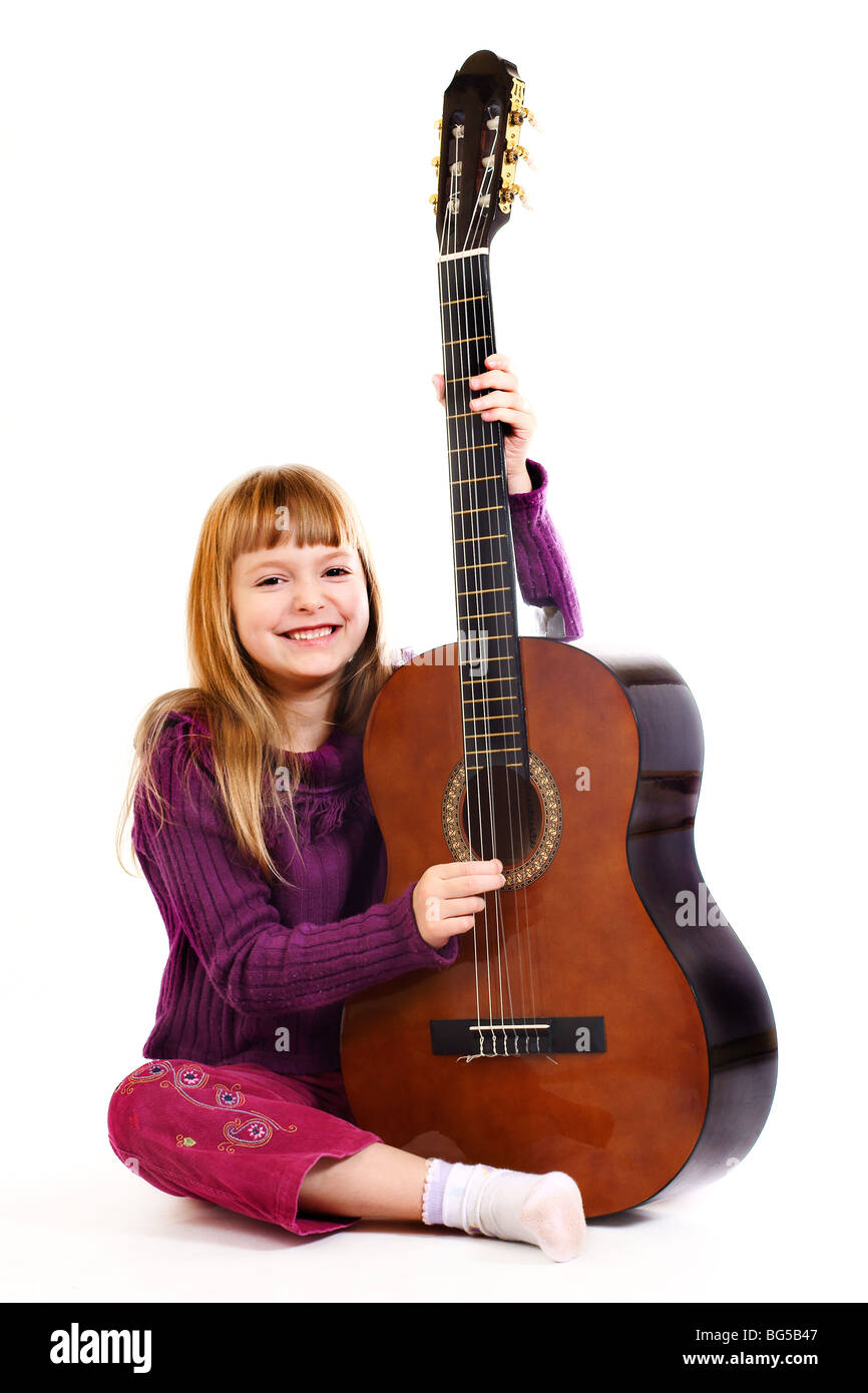 Young girl playing acoustic guitar Stock Photo - Alamy