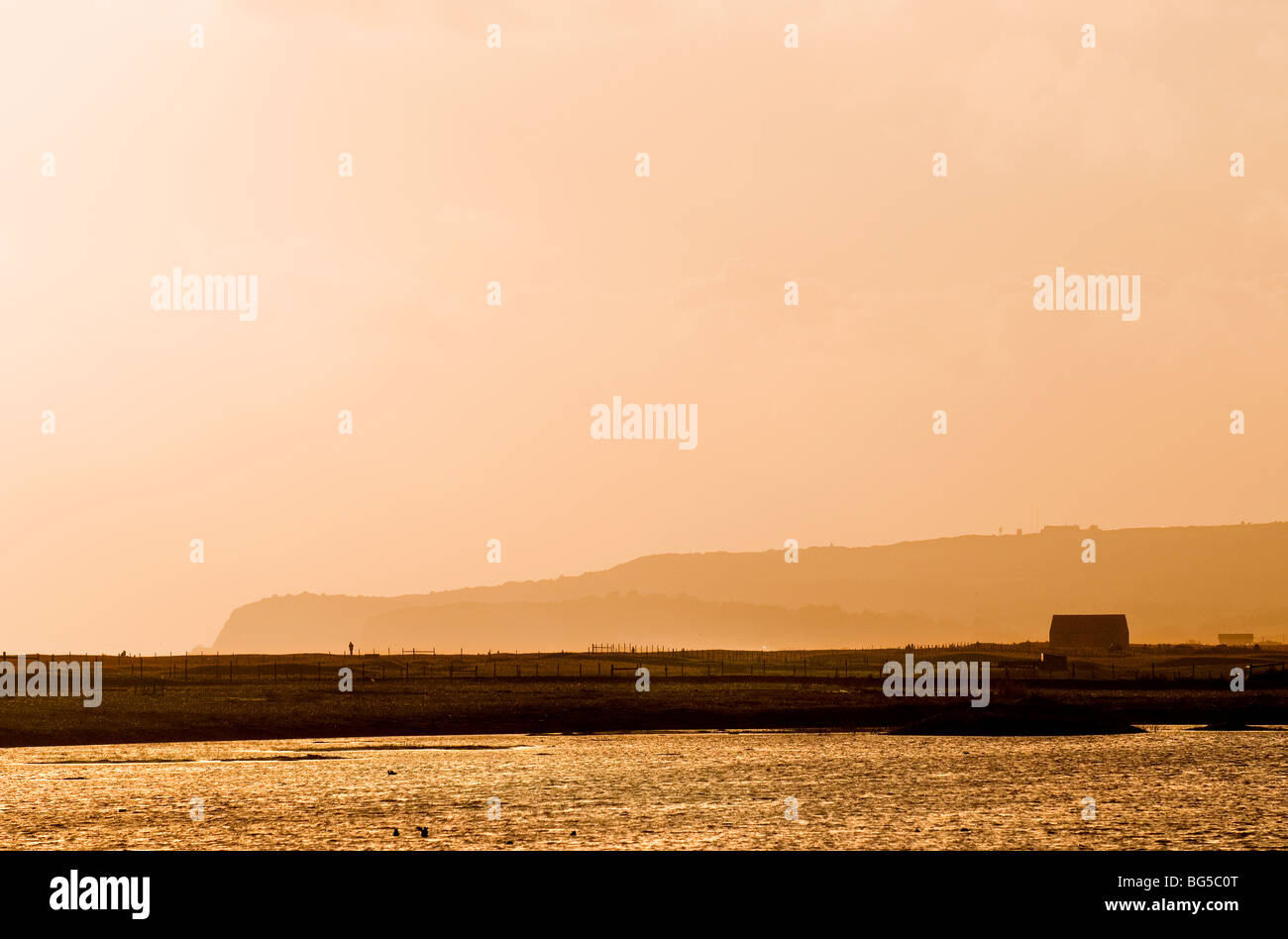 Sunset over Rye Harbour Nature Reserve in East Sussex. Photo by Gordon ...