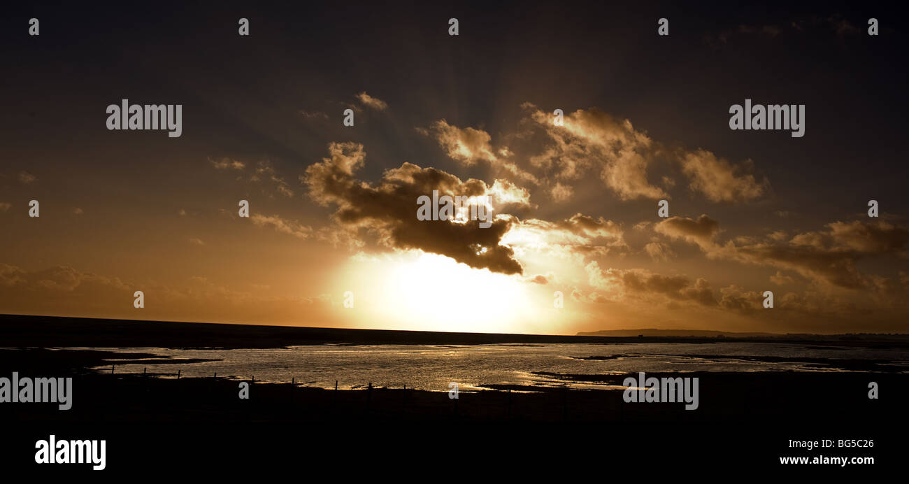 Sunset over Rye Harbour Nature Reserve in East Sussex. Photo by Gordon ...
